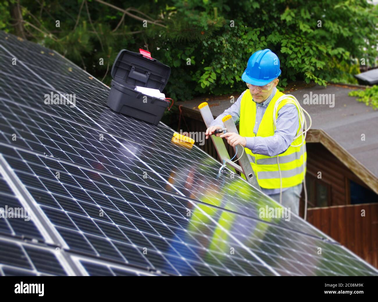Installation and commissioning of solar panels. Renewable energy in a ...