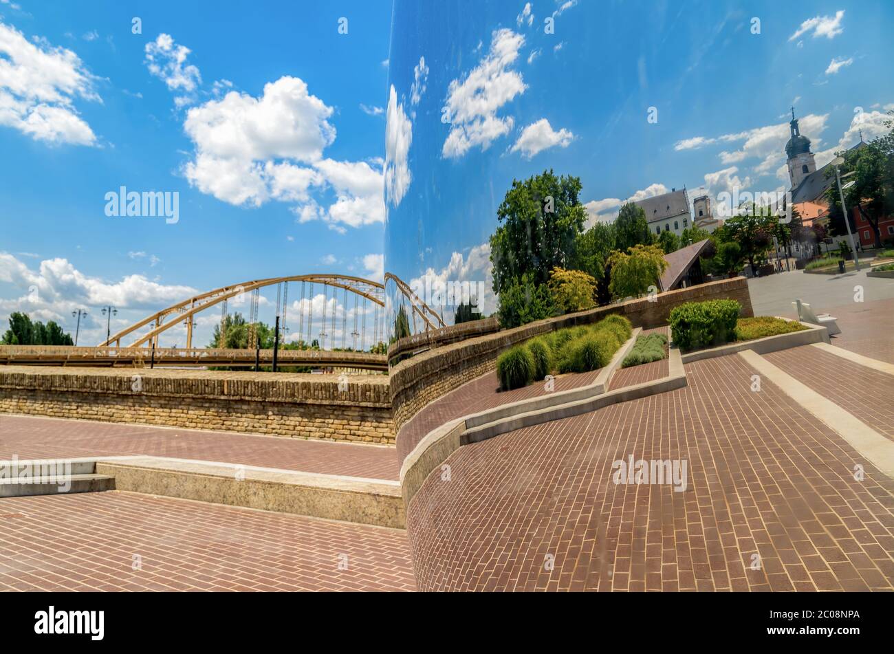 Hungary, Gyor. Cityscape from the riverbank of Raba at Dunakapu Square ...