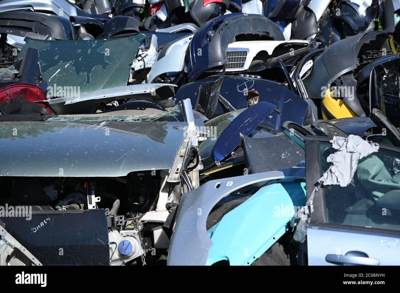Car waste, crushed cars in a million parts near steel factory Stock ...