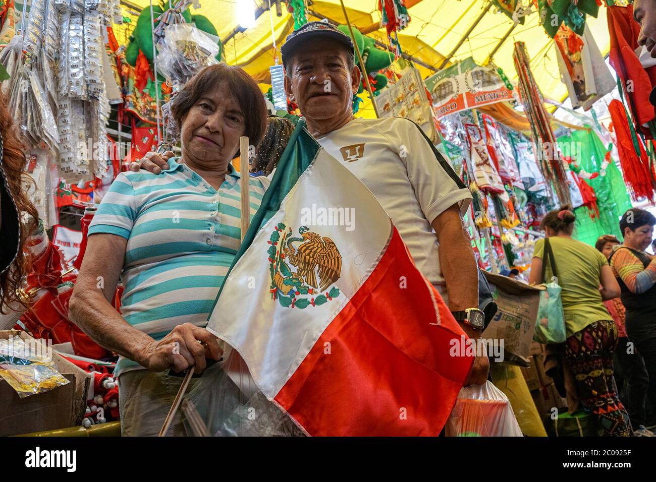 Silvia Alarcón, 72 (left), and Álvaro Martínez, 73, shop for Mexican Independence Day ...