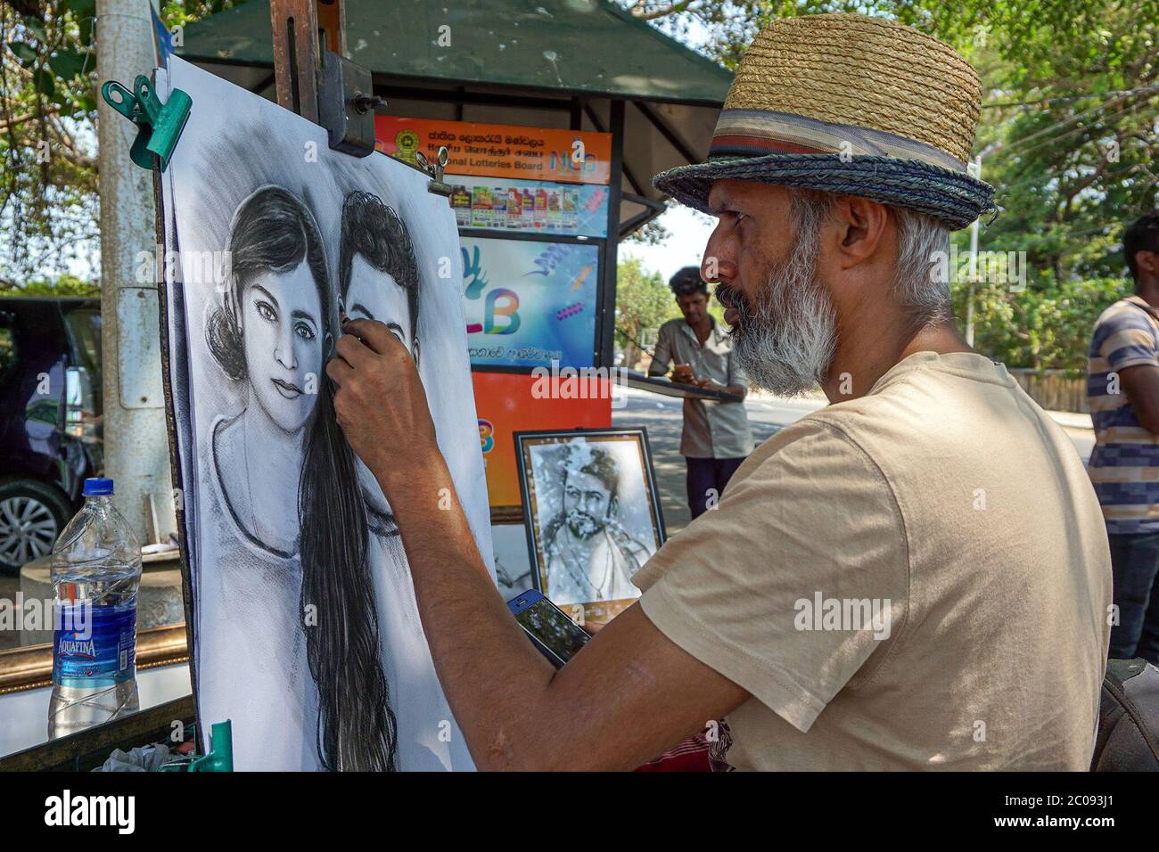 Manjula Swarnapali, a portrait artist, uses a cellphone photo as a ...