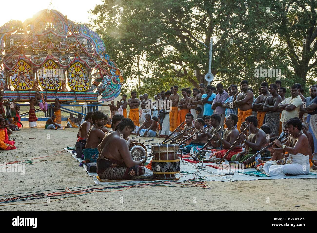 Musicians play the melam, a percussion instrument, and the nadaswaram ...