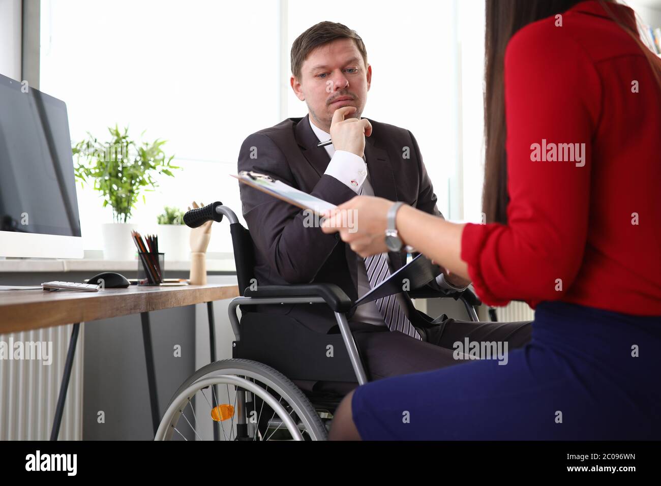 Adult in presentable black suit Stock Photo - Alamy