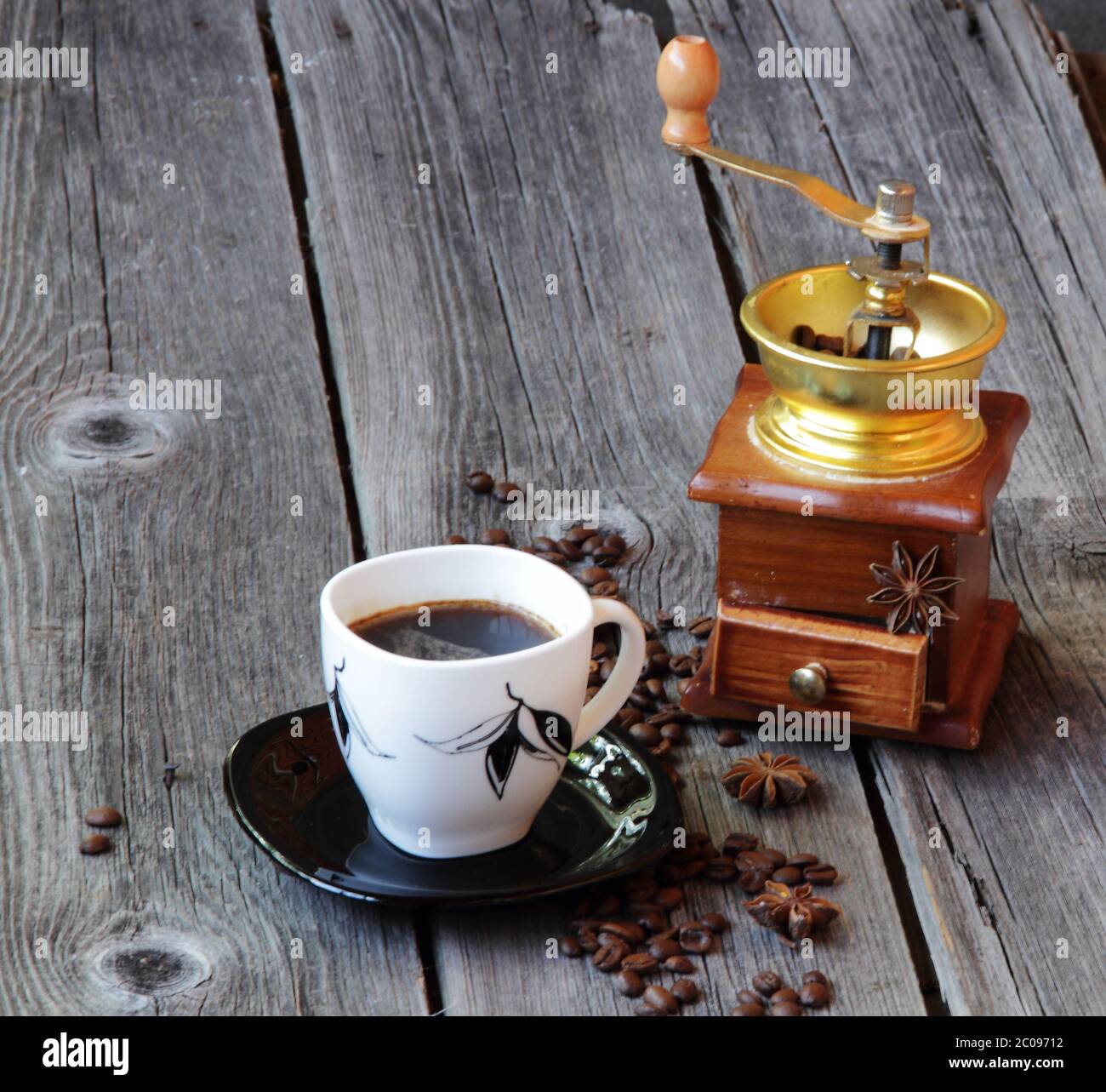 Coffee in a coffee cup in an environment of coffee Stock Photo - Alamy