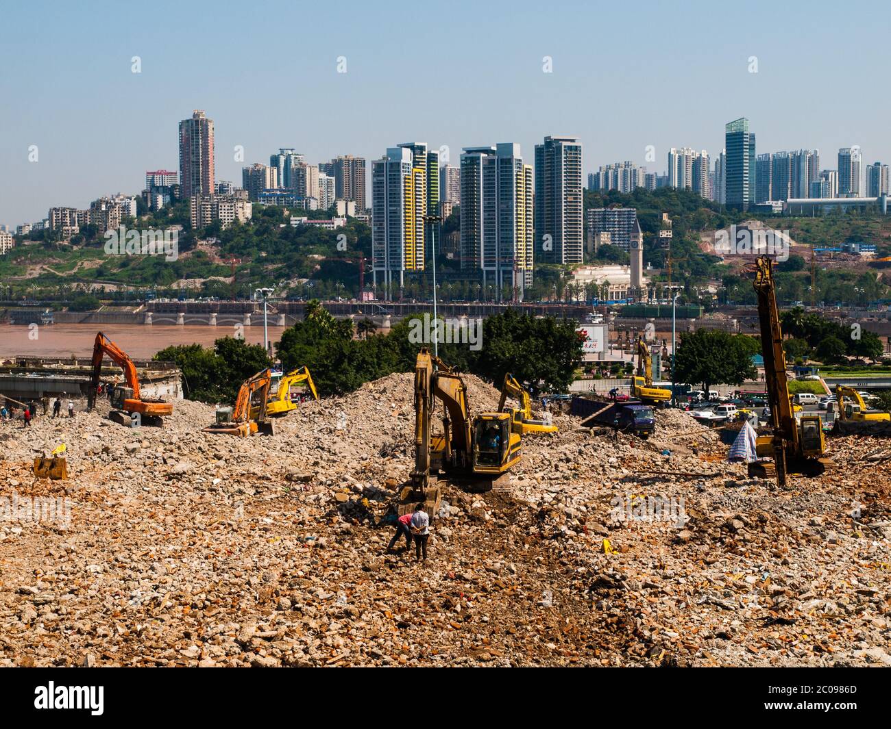 Excavators demolish old building (China Stock Photo - Alamy