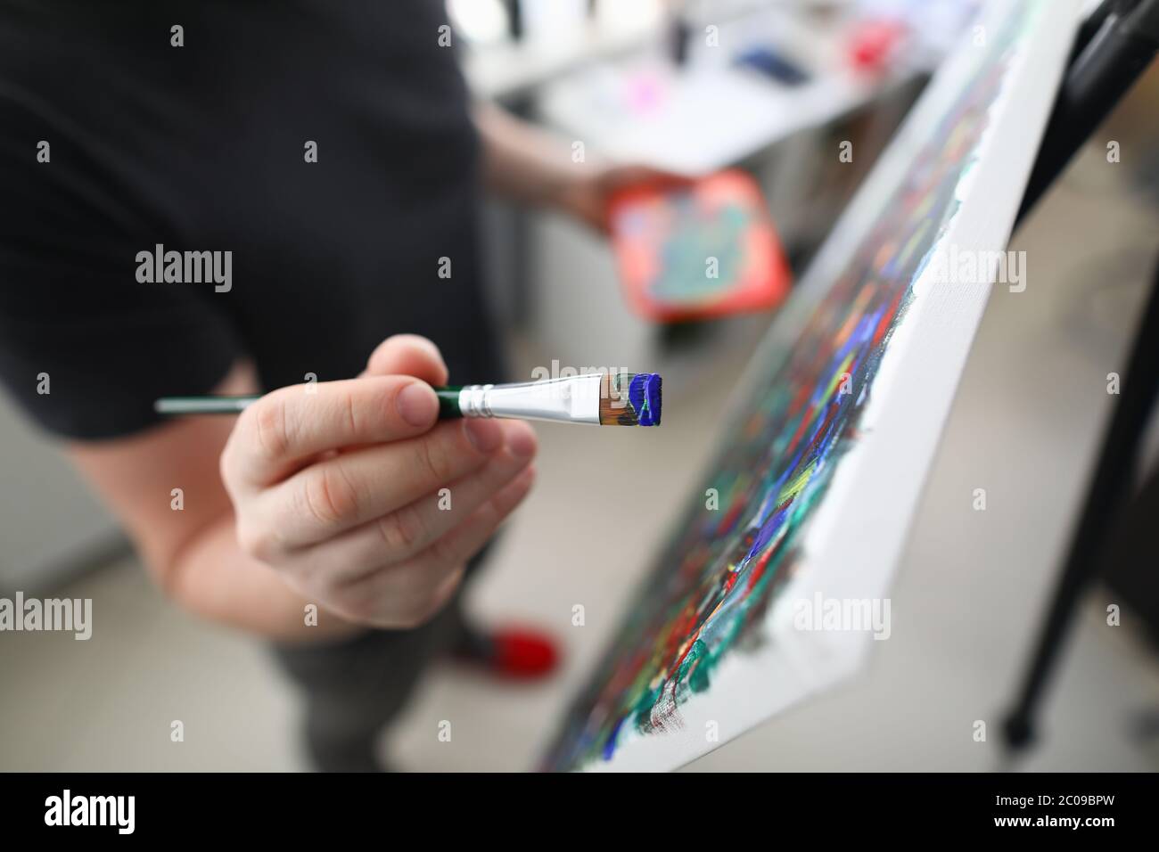 Painter holding fresh paint hi-res stock photography and images - Alamy