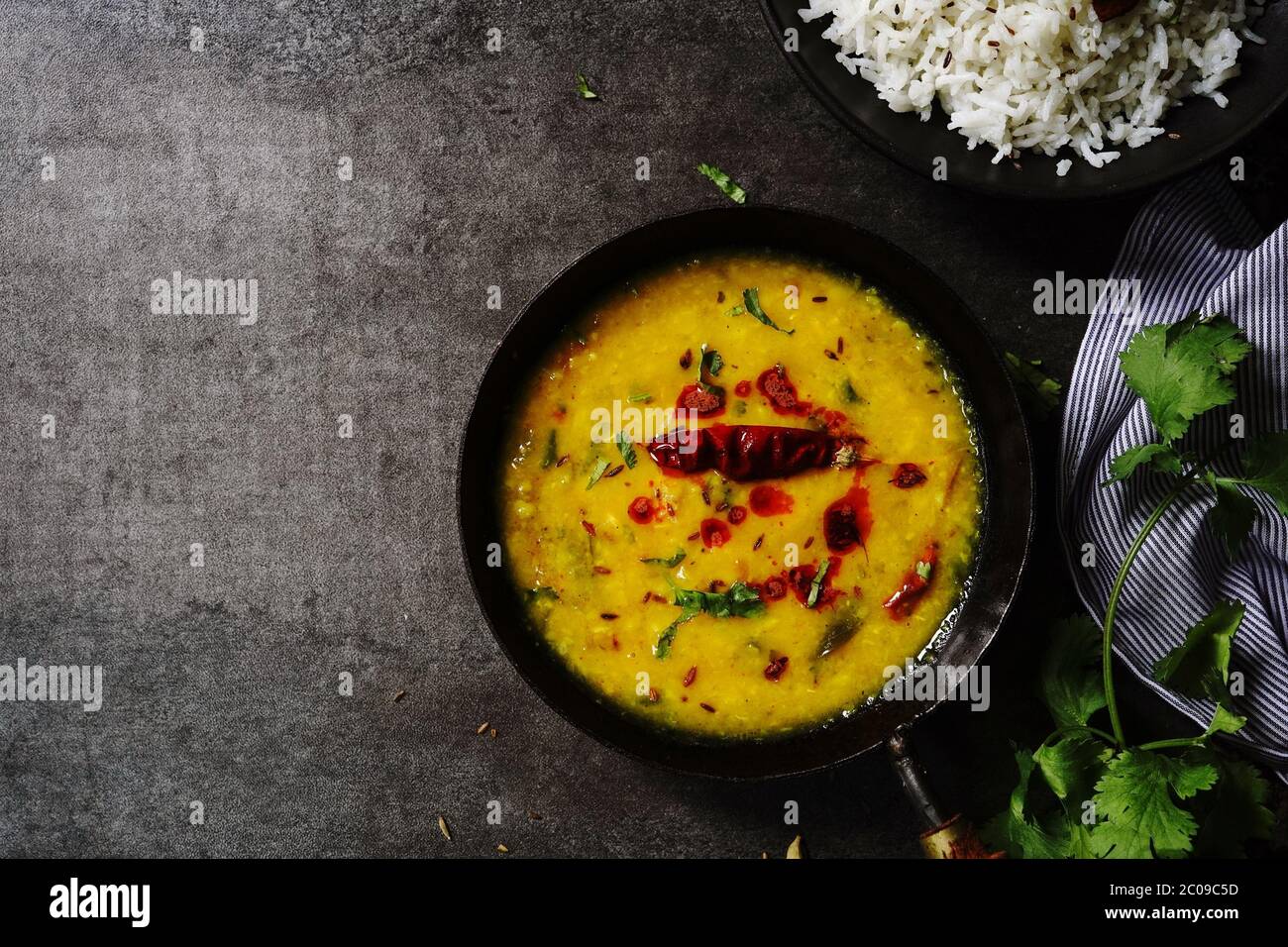 Dal Tadka /Daal fry-Indian lentil curry with Jeera rice Stock Photo - Alamy