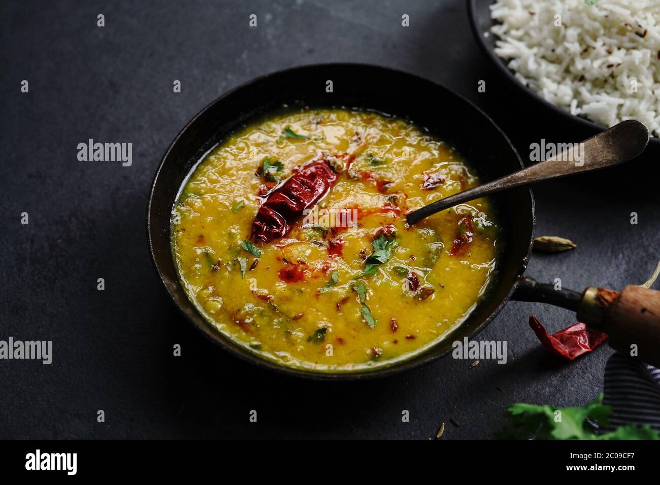 Dal Tadka /Daal fry-Indian lentil curry with Jeera rice Stock Photo - Alamy