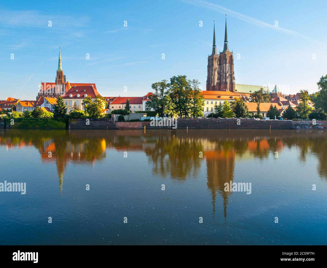 Panorama of Cathedral Island and its reflection in the river, Wroclaw ...