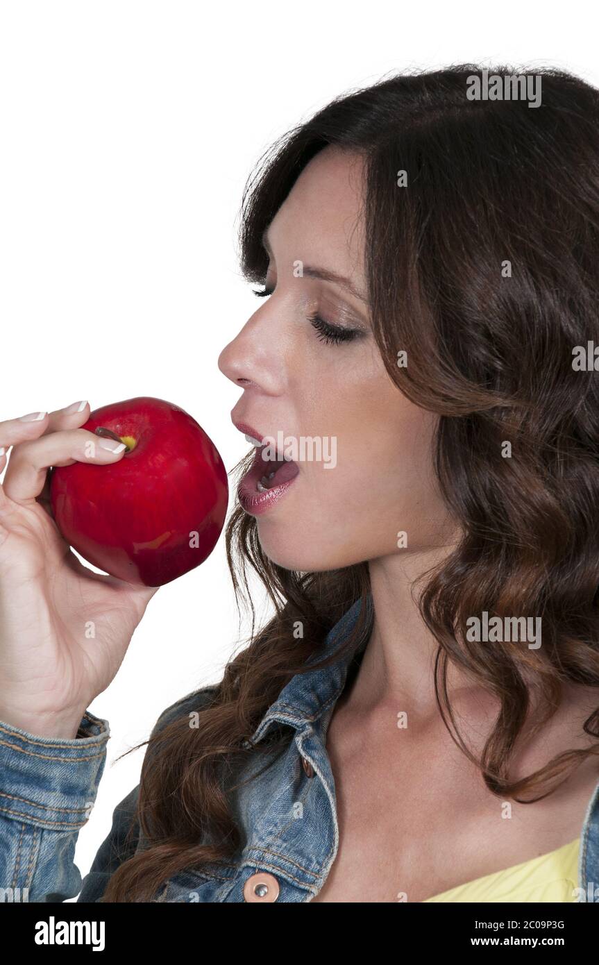 Woman Eating an Apple Stock Photo - Alamy