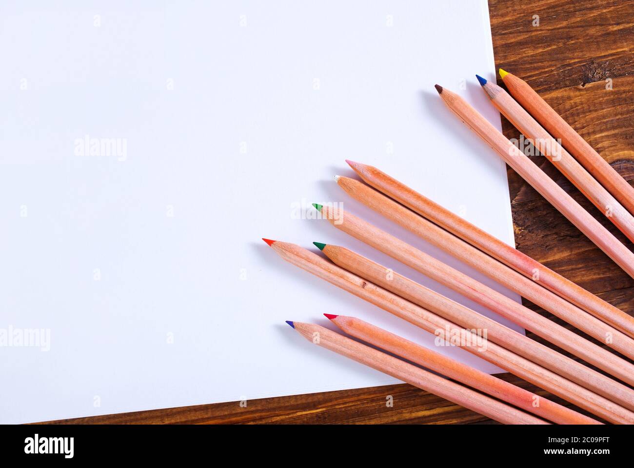paper and color pencils Stock Photo - Alamy