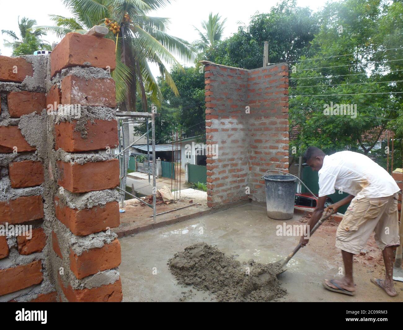 Men working on a construction site, building walls from Bricks. Colombo ...