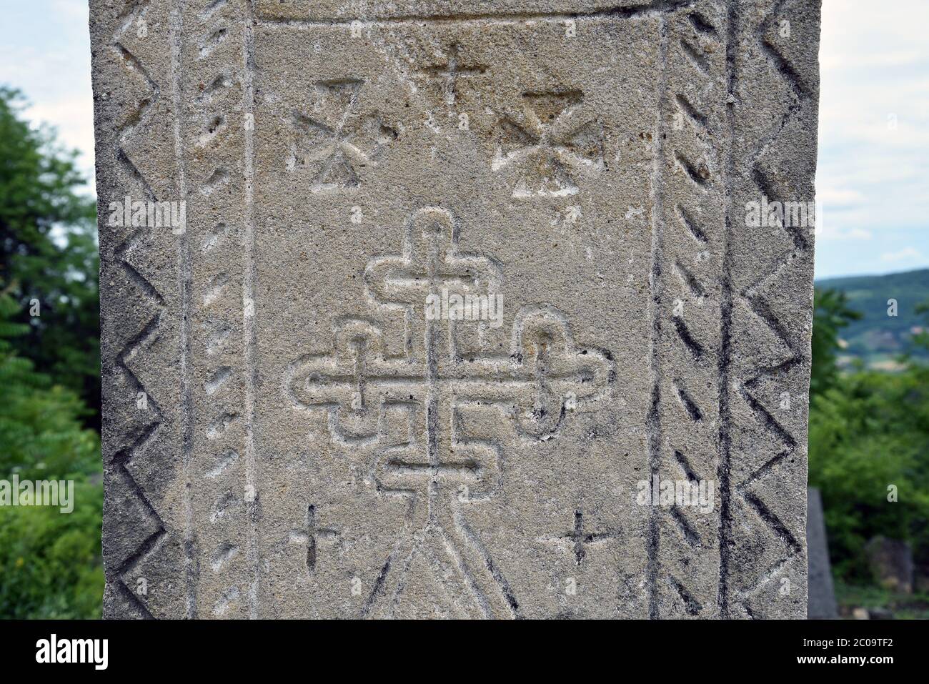 Ancient Orthodox and Vedic symbols on tombstones in graveyard in East ...