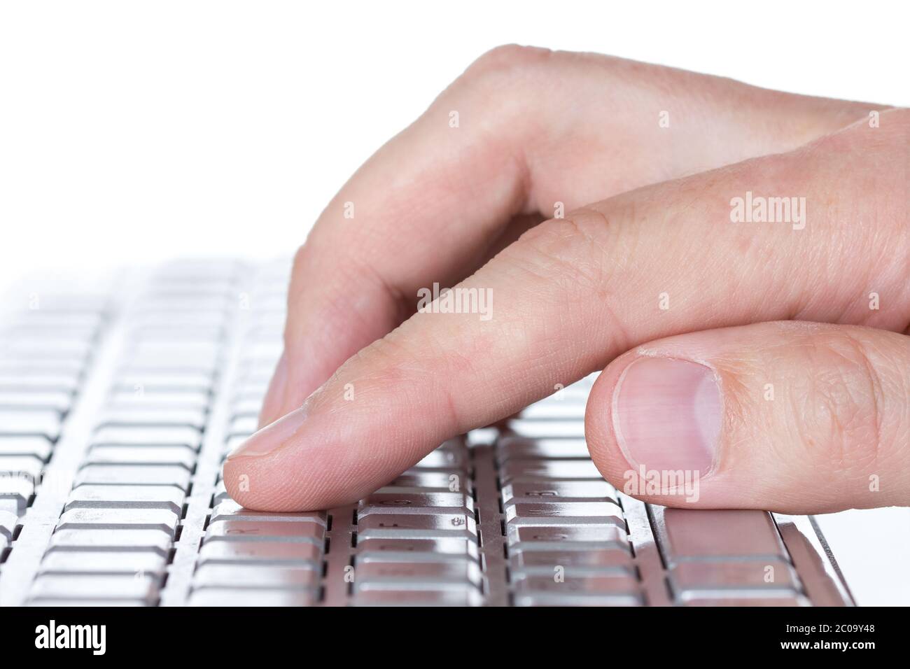 Hand typing on keyboard Stock Photo - Alamy