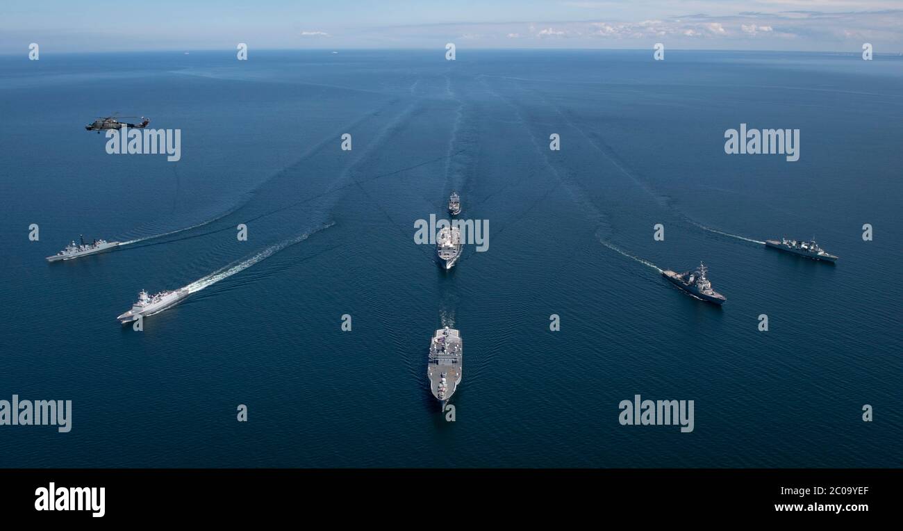 Navy ships from NATO member nations in sail in formation during ...