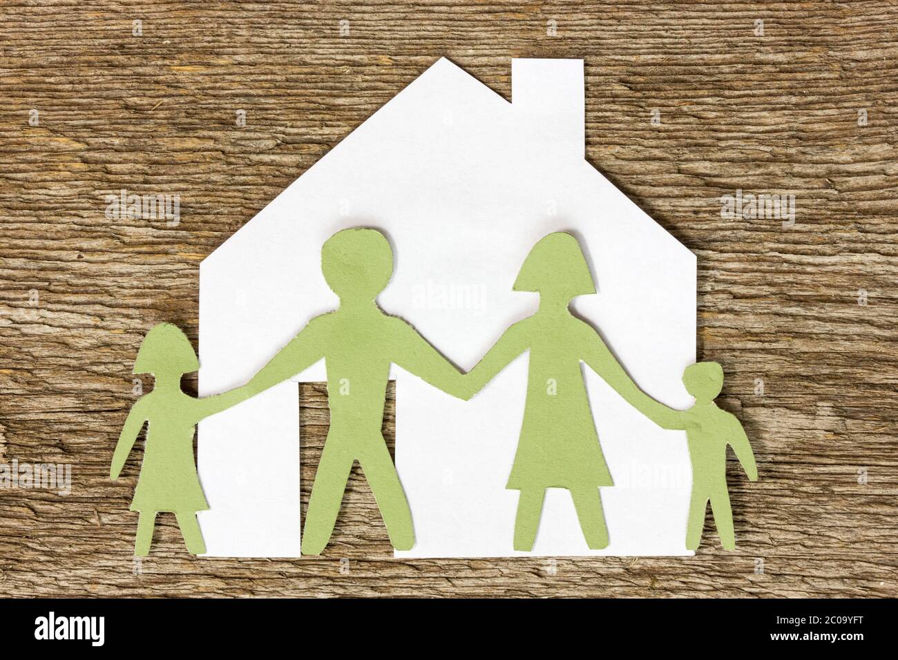 Family figure paper house hi-res stock photography and images - Alamy