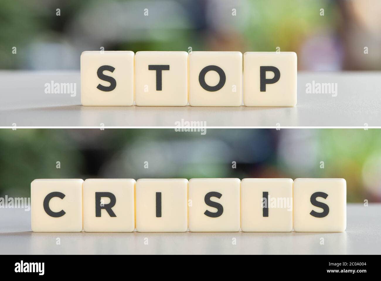 collage of white cubes with stop crisis words on white surface Stock ...