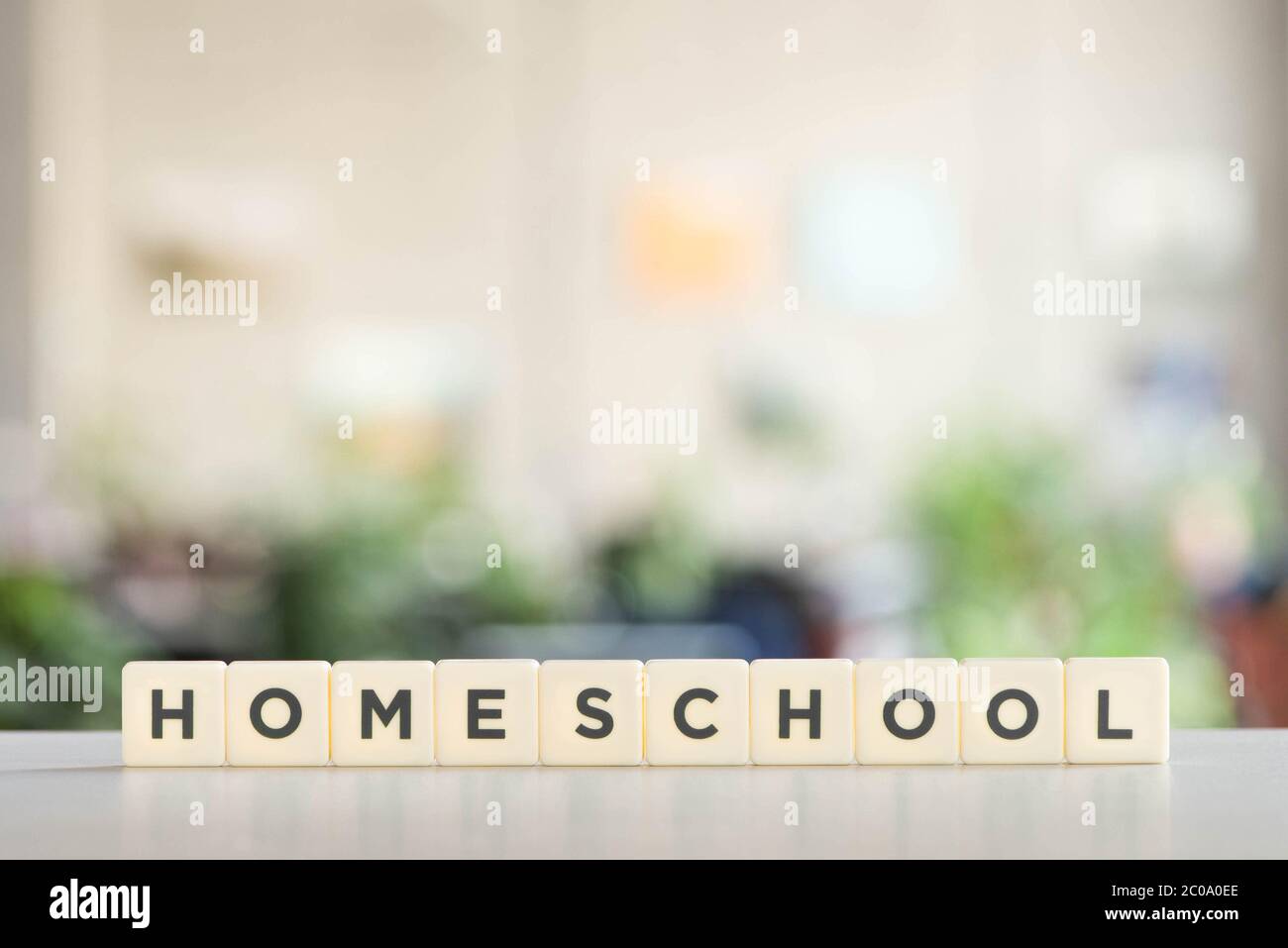 white blocks with homeschool lettering on white desk Stock Photo - Alamy