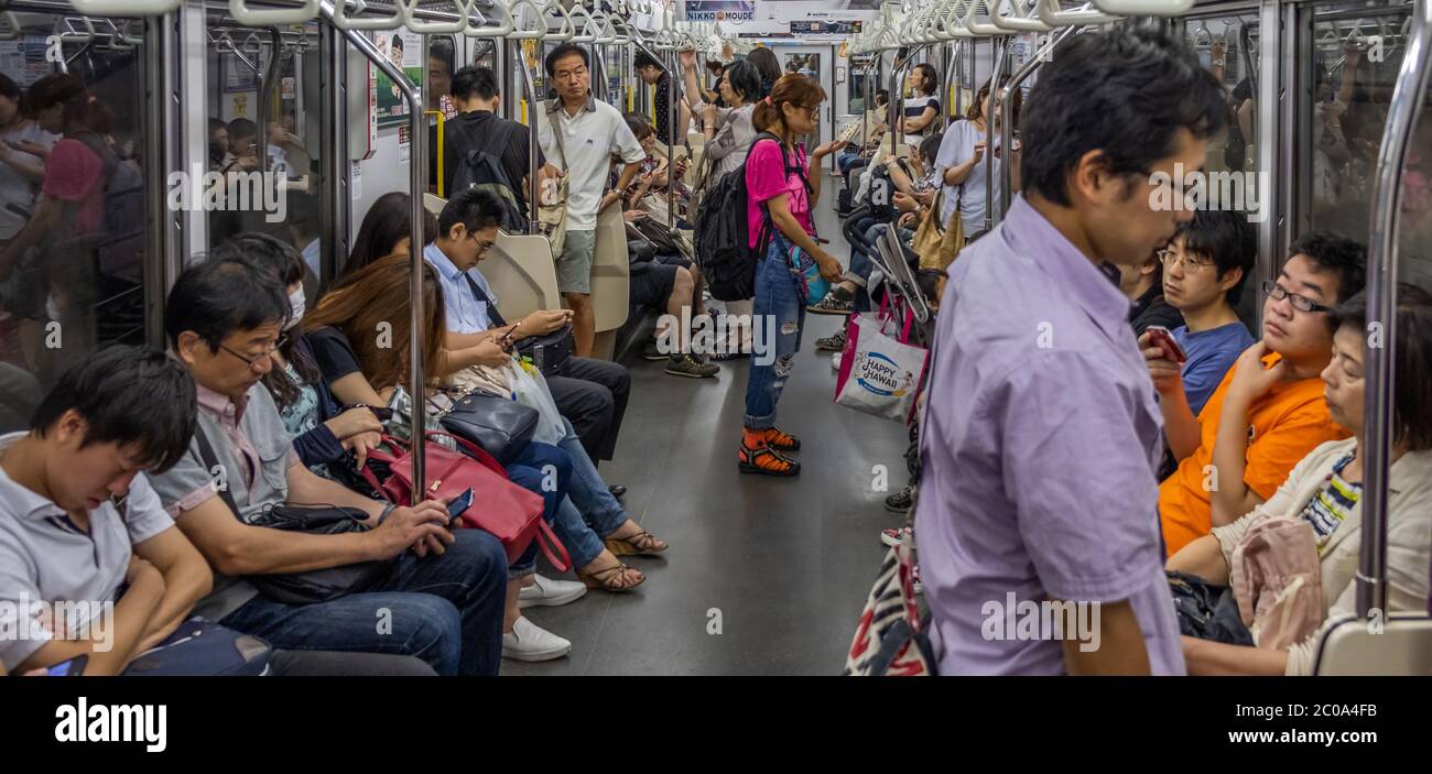 Commuter in Japan Railway train, Tokyo, Japan Stock Photo - Alamy