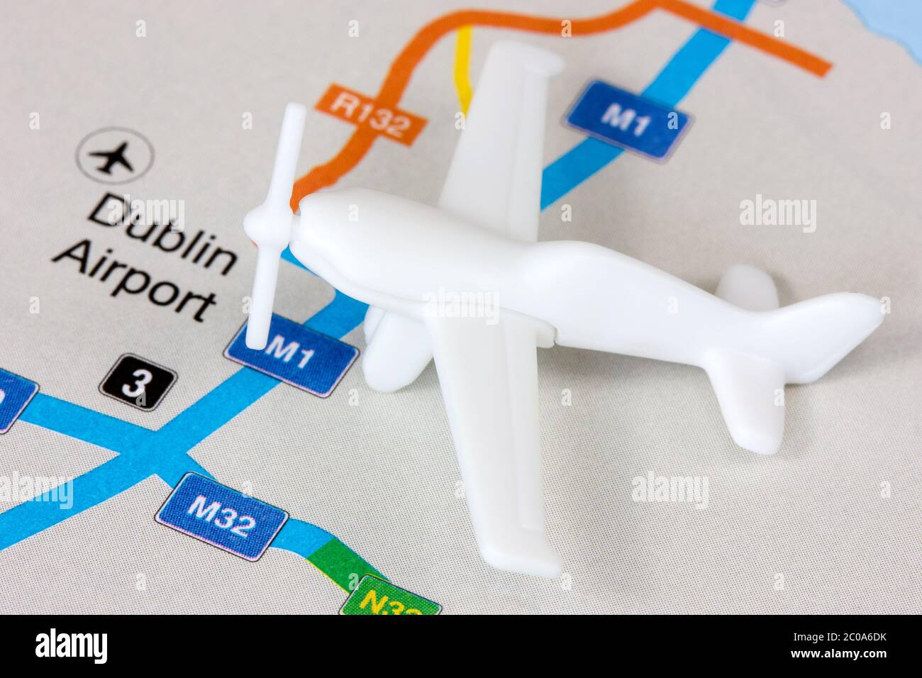 Airplane on the map Stock Photo - Alamy