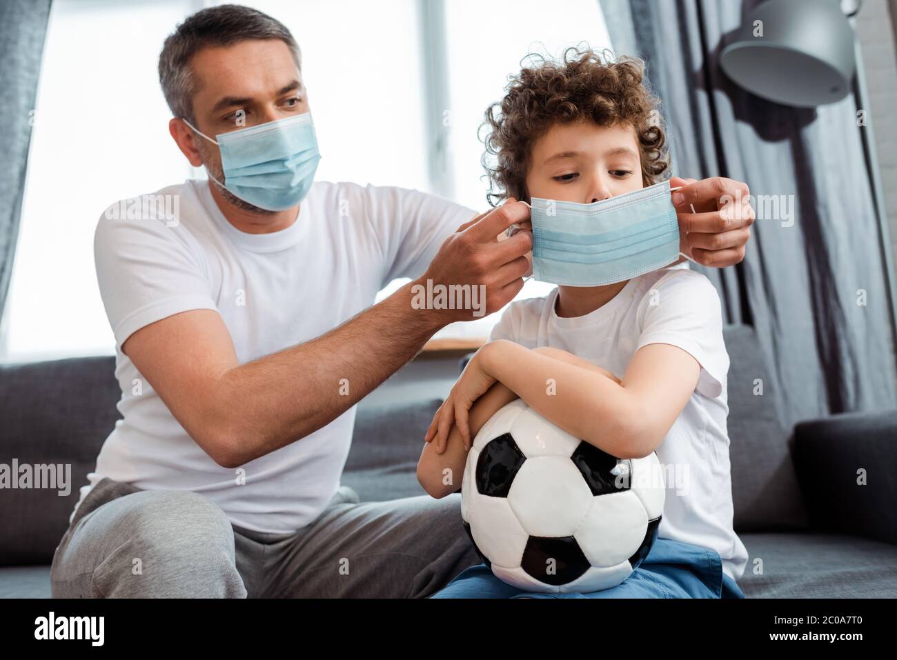 Father son wearing mask hi-res stock photography and images - Alamy