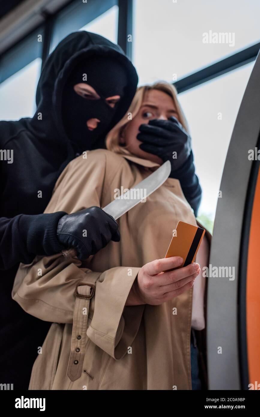 Man hand covering mouth scared girl hi-res stock photography and images ...