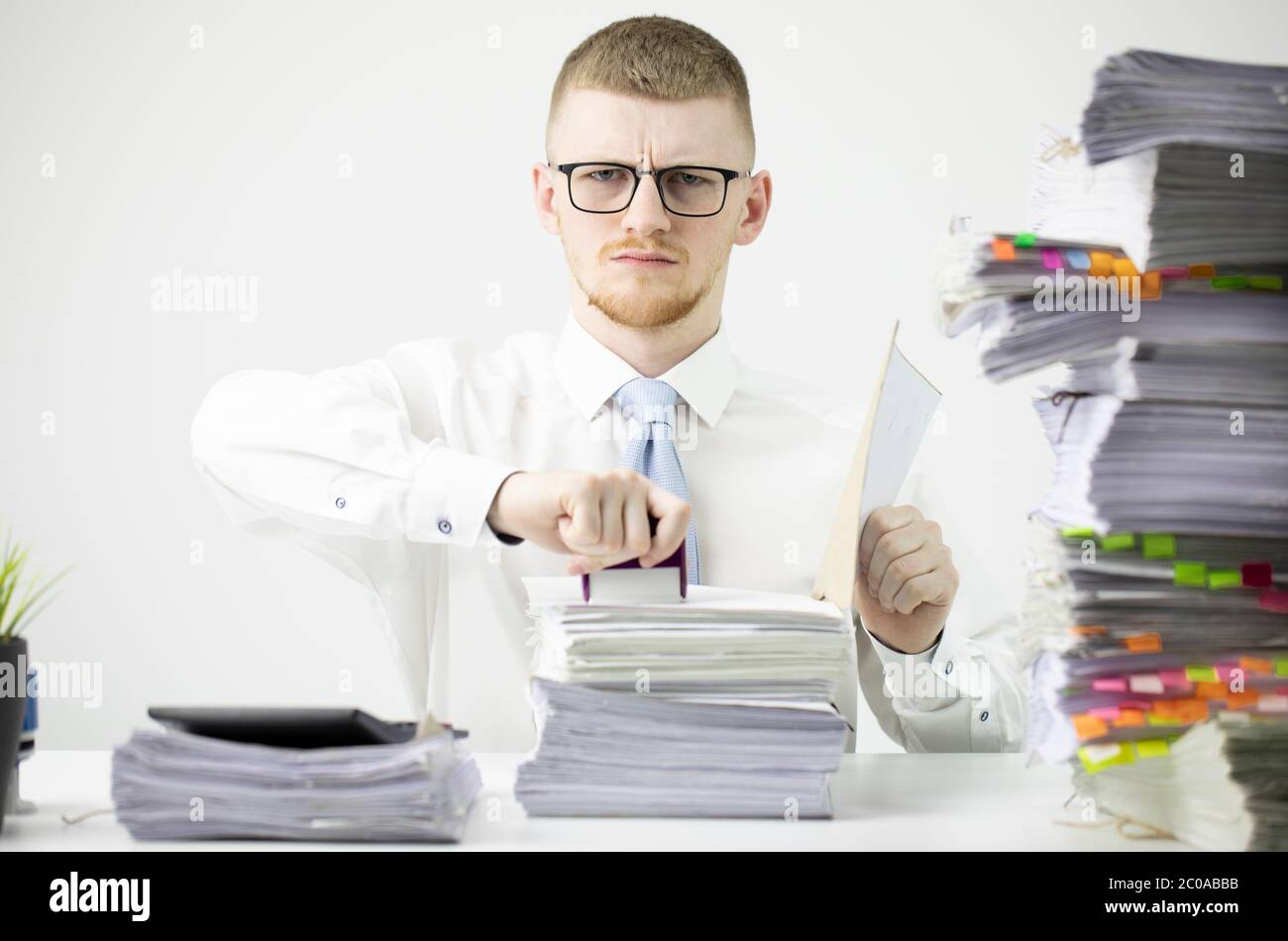 Office worker and piles paper hi-res stock photography and images - Alamy
