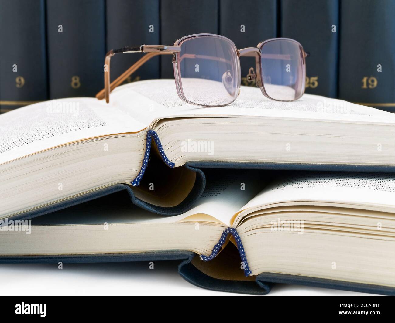 Books and Glasses Stock Photo - Alamy