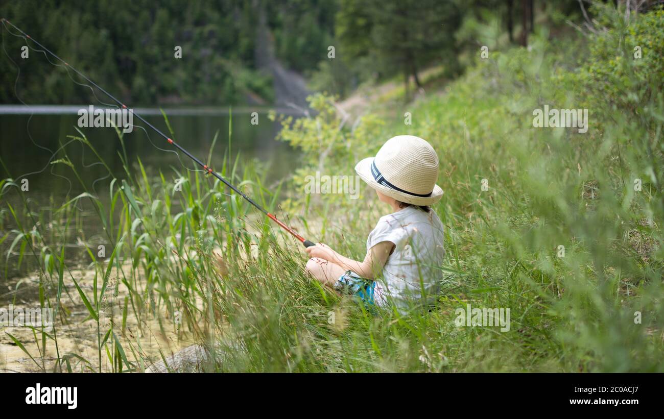 Child Fishing By The Lake Background Stock Photo Stock Photo - Alamy