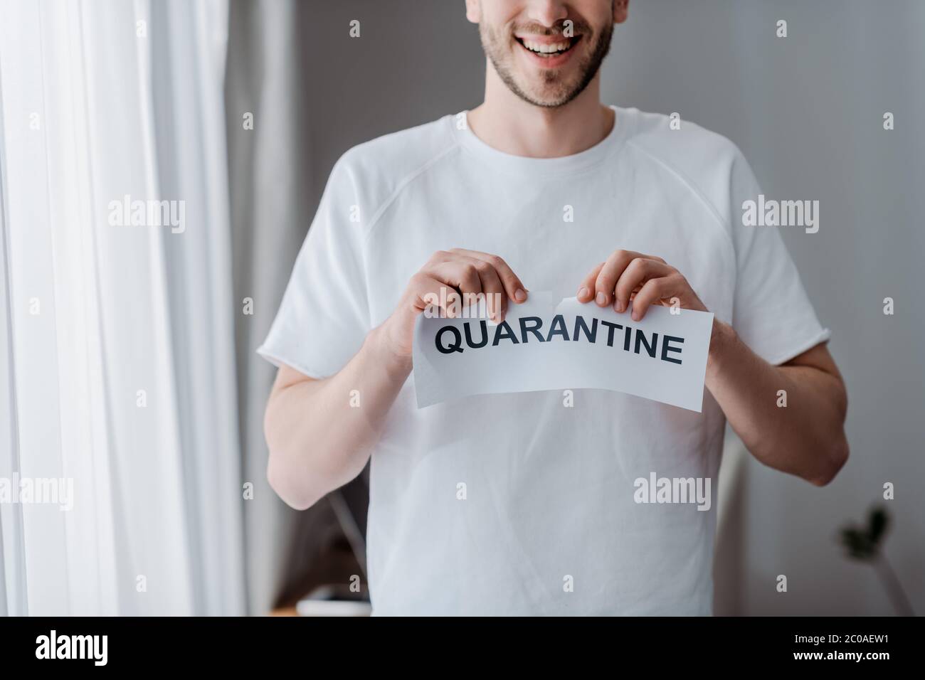 Man ripping paper hi-res stock photography and images - Alamy