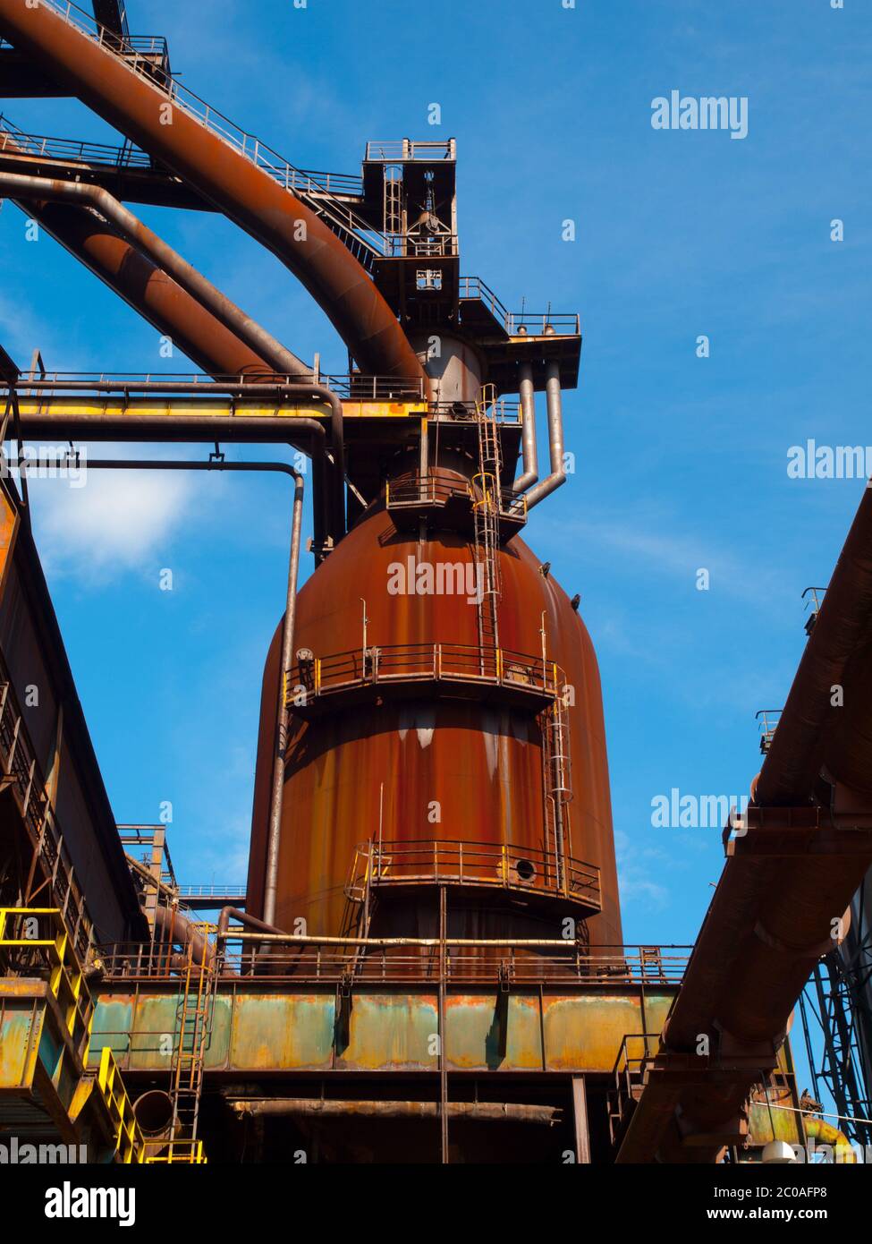 Big rusty pipes in an industrial factory Stock Photo - Alamy