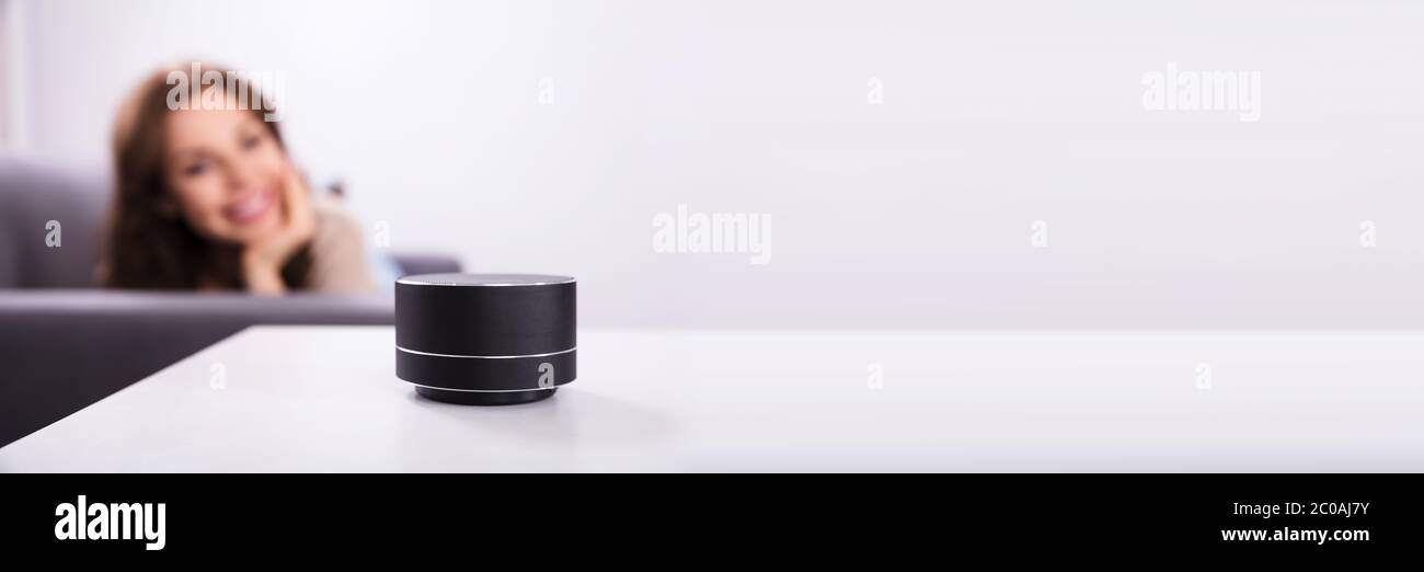 Smart Speaker With Voice Assistant. Wireless Music Control Stock Photo ...