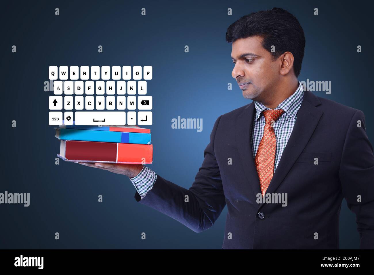 Business man with text book Stock Photo - Alamy