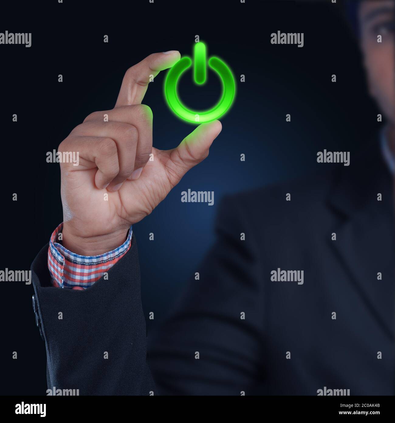 Man showing the power button Stock Photo - Alamy