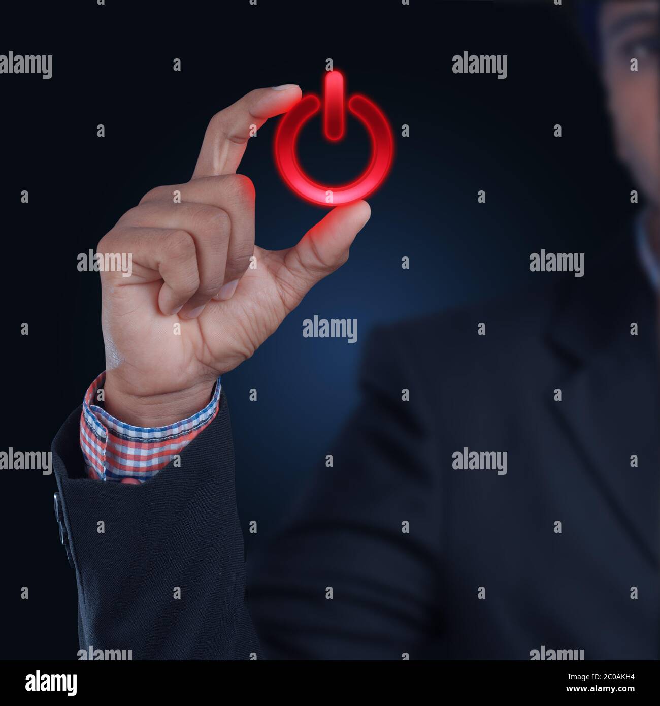 Man showing the power button Stock Photo - Alamy