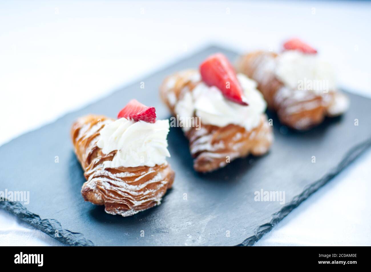 Typical sweet Italian consist cannoli , baba and pastries Stock Photo ...