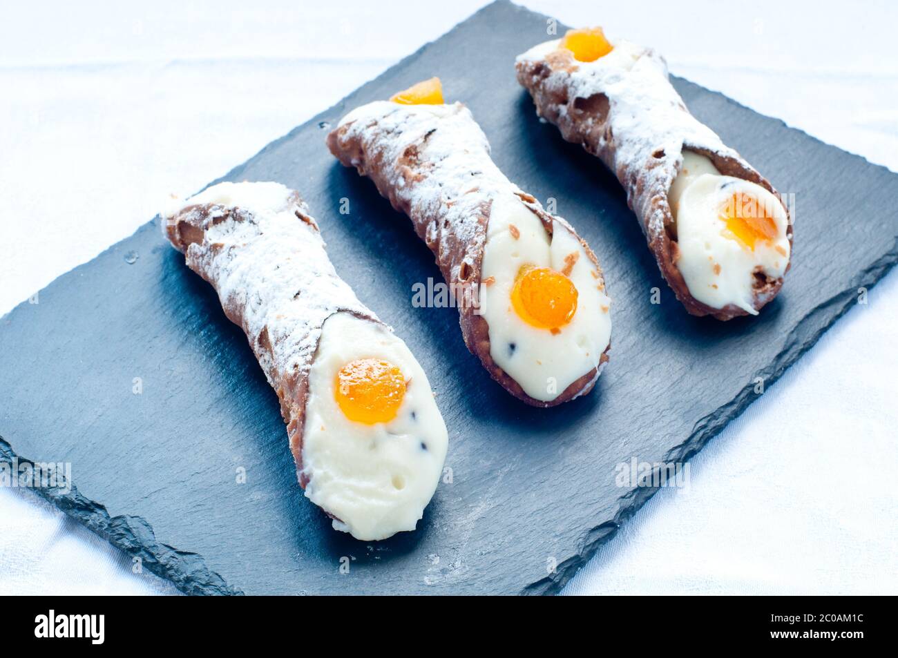 Typical sweet Italian consist cannoli , baba and pastries Stock Photo ...
