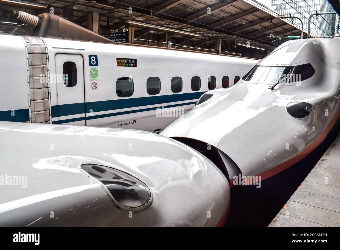 Japanese high speed Shinkansen bullet train standing on a platform in ...