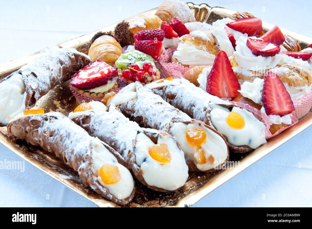 Typical sweet Italian consist cannoli , baba and pastries Stock Photo ...