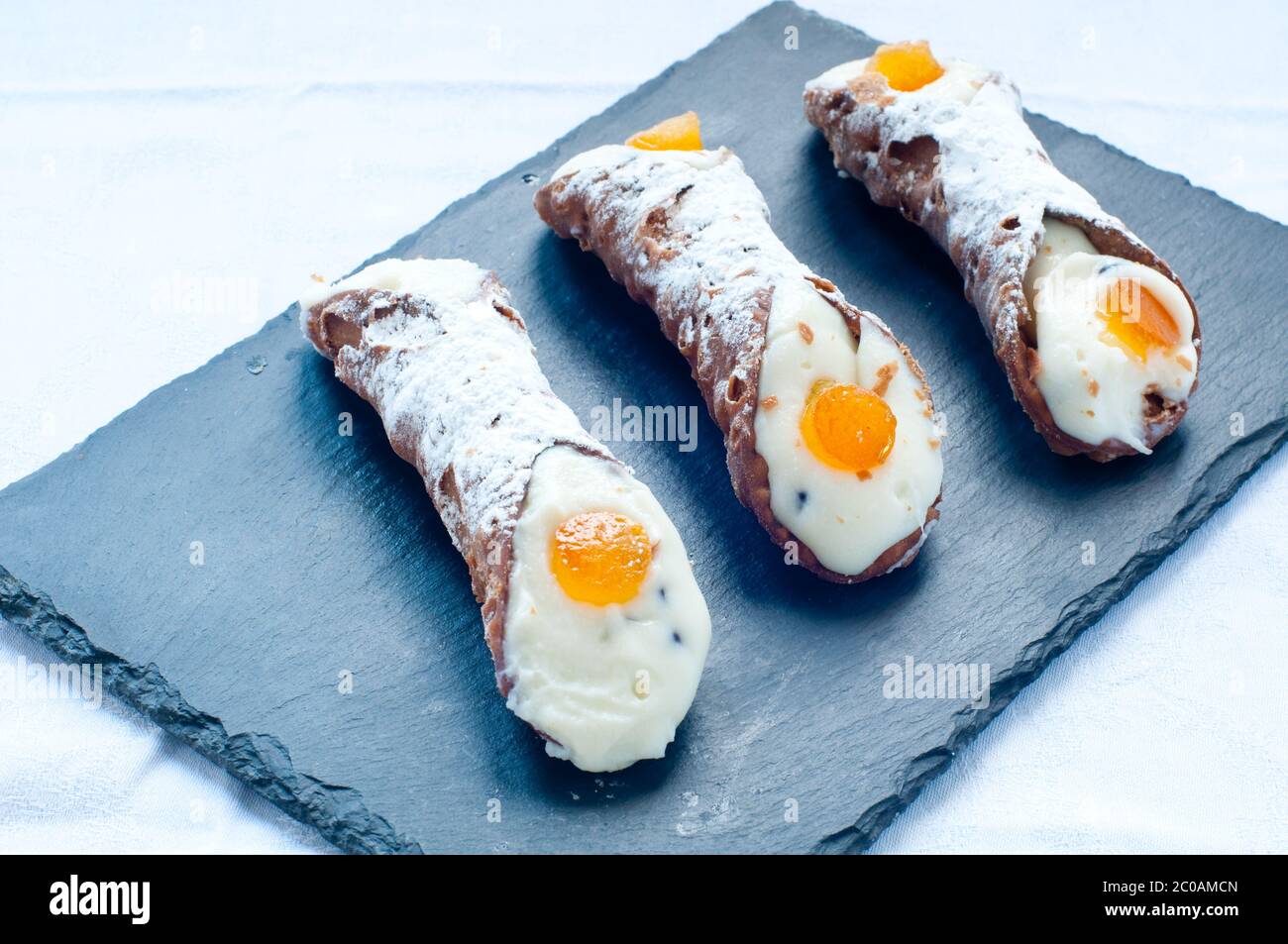 Typical sweet Italian consist cannoli , baba and pastries Stock Photo ...