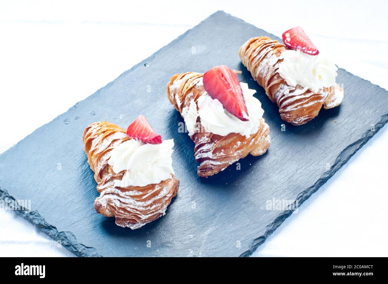 Typical sweet Italian consist cannoli , baba and pastries Stock Photo ...