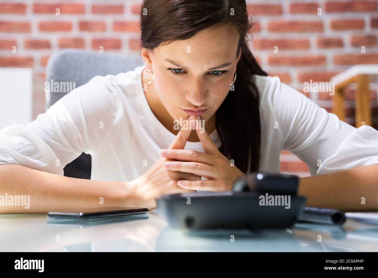 Waiting Landline Telephone Or Phone Call At Office Desk Stock Photo - Alamy