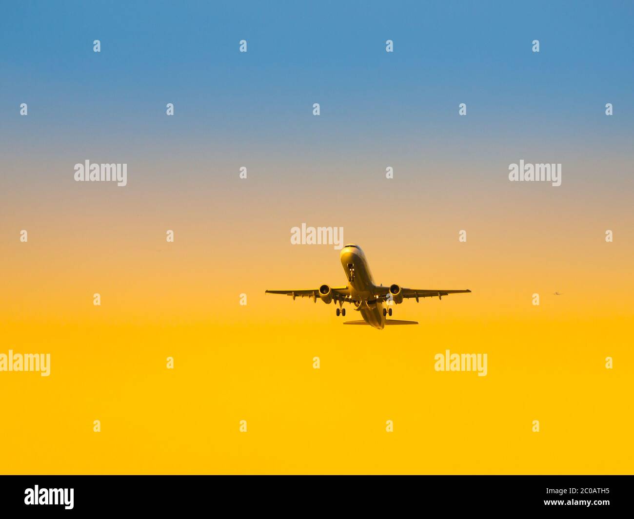 Aircraft take-off from airport at sunset time. Air transportation and ...