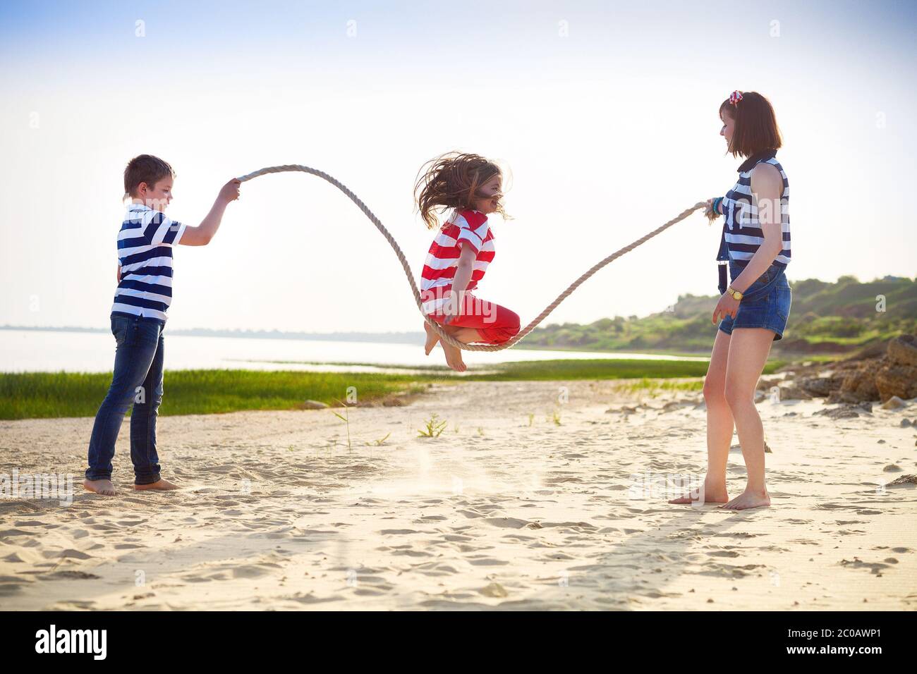 Family tug war beach hi-res stock photography and images - Alamy