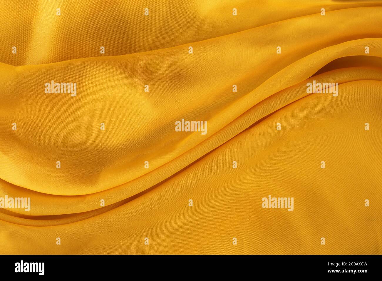 Yellow cloth background abstract with soft waves Stock Photo - Alamy