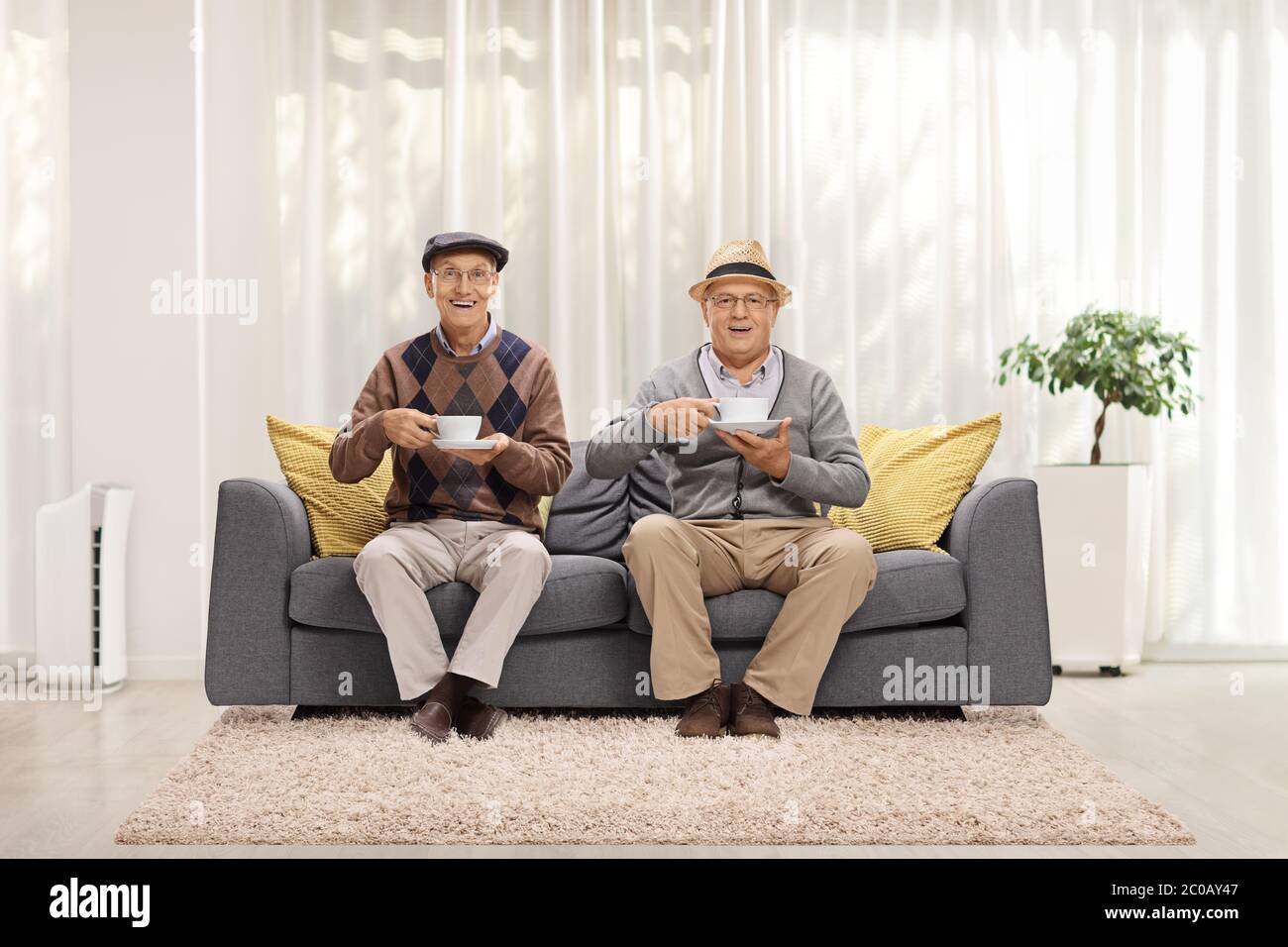 Two men drinking tea hi-res stock photography and images - Alamy