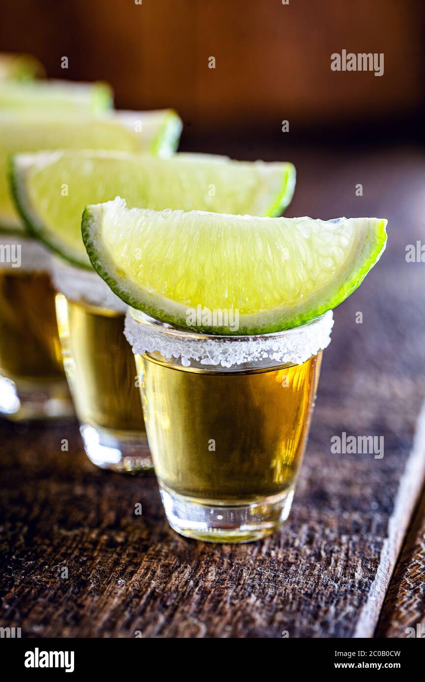 detail of the tequila drink, with a specific focus on the lemon ...