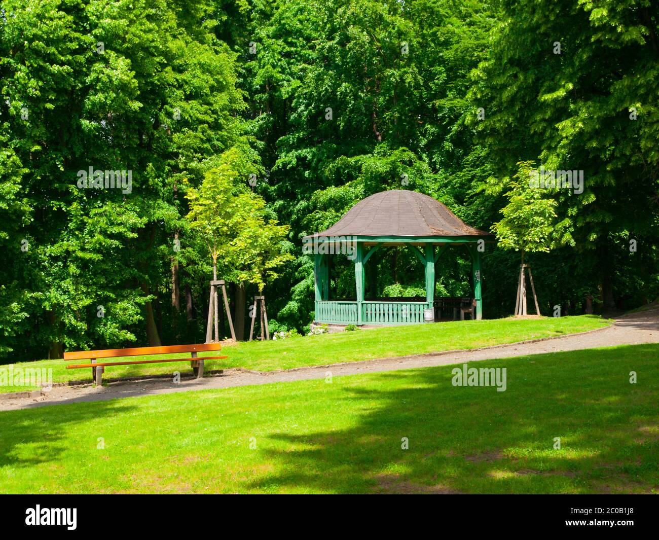 Green wooden park pavilion in sunny summer day Stock Photo - Alamy