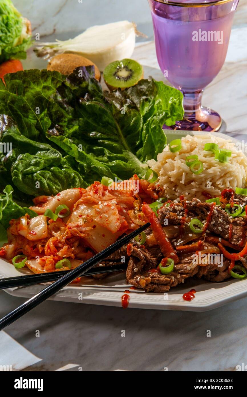 Korean beef bulgogi ssambap lettuce wraps with spicy kimchi and ...