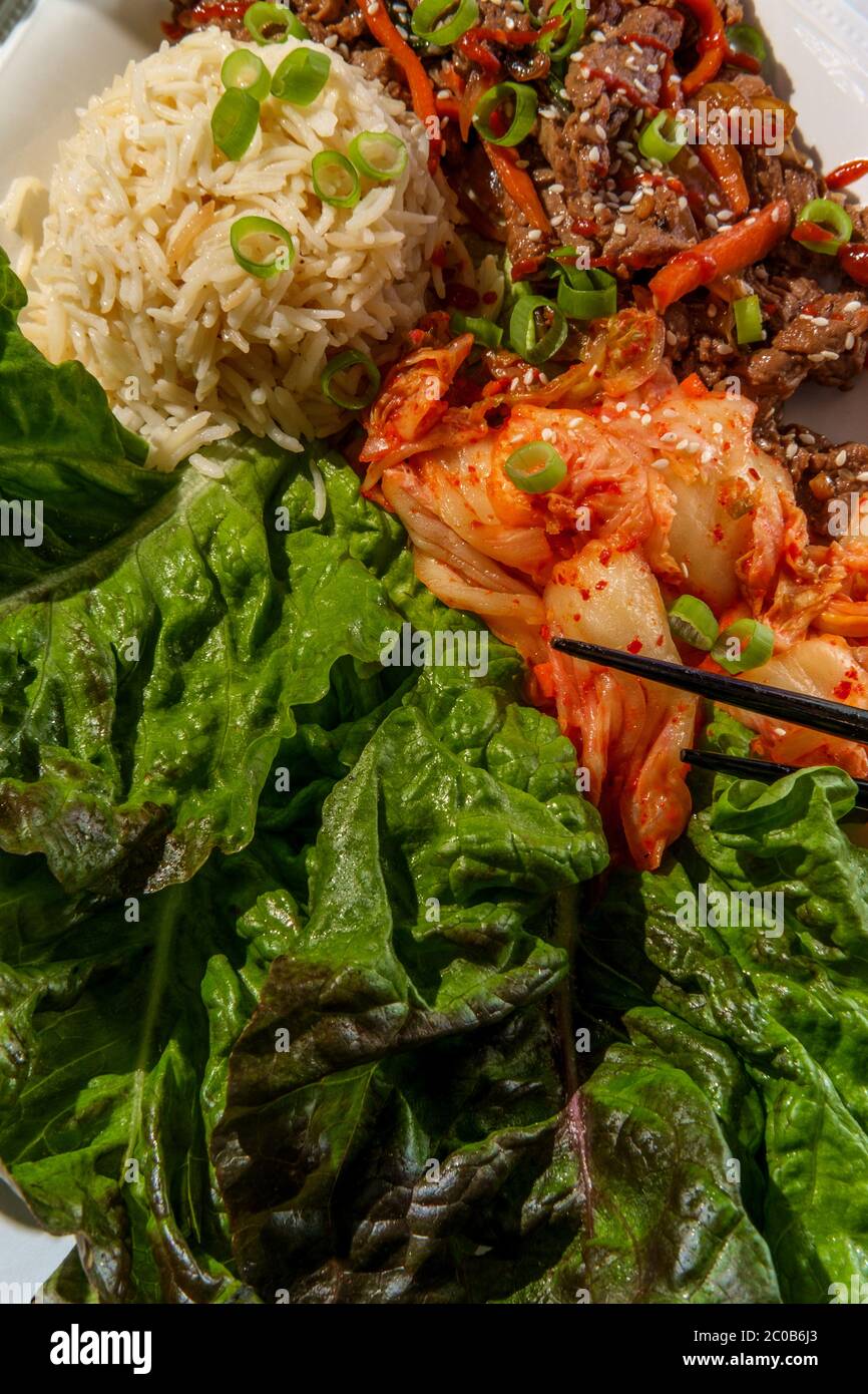 Korean beef bulgogi ssambap lettuce wraps with spicy kimchi and ...